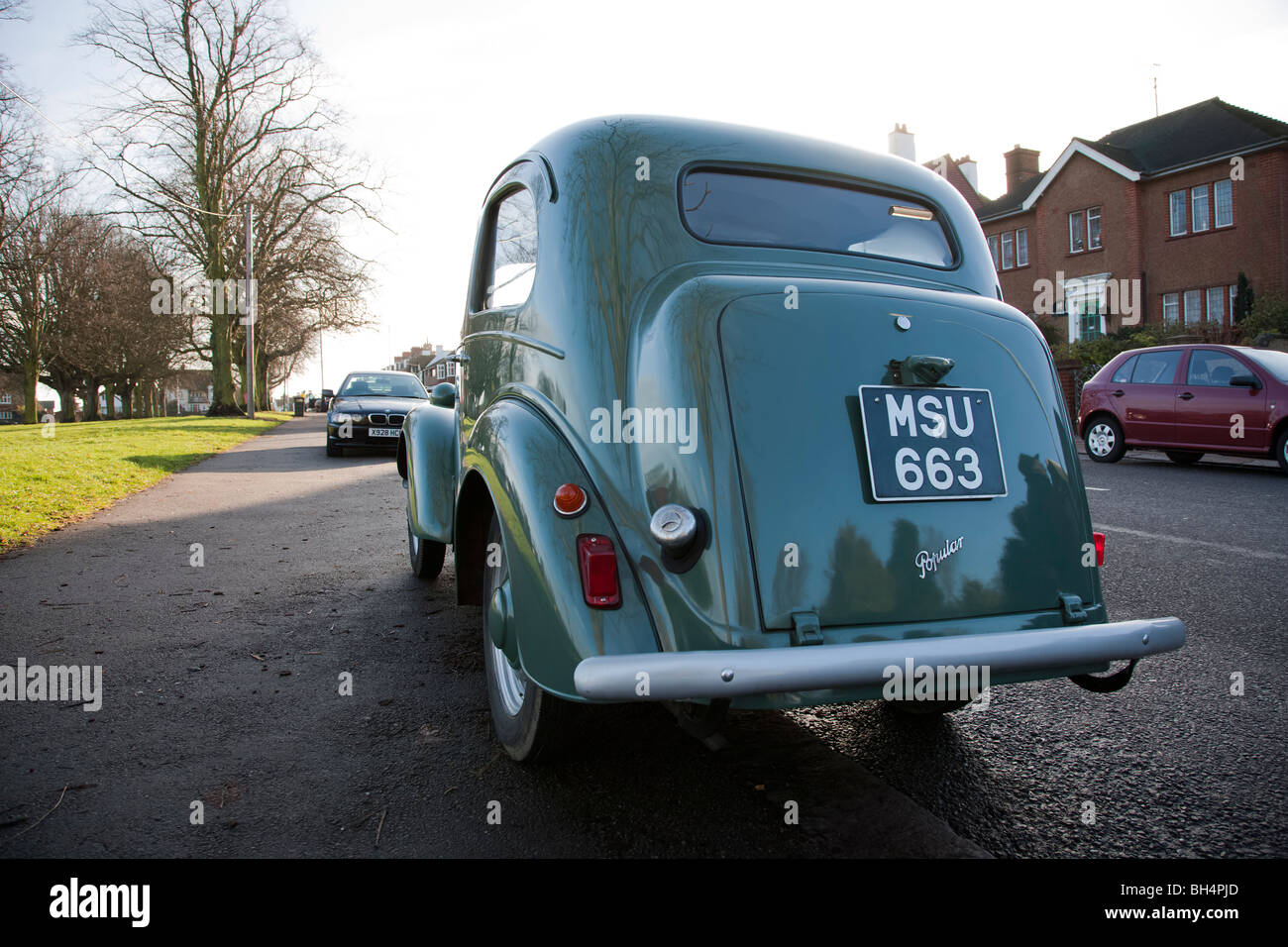 Old Green Ford Popular parked on pavement in Northampton ...