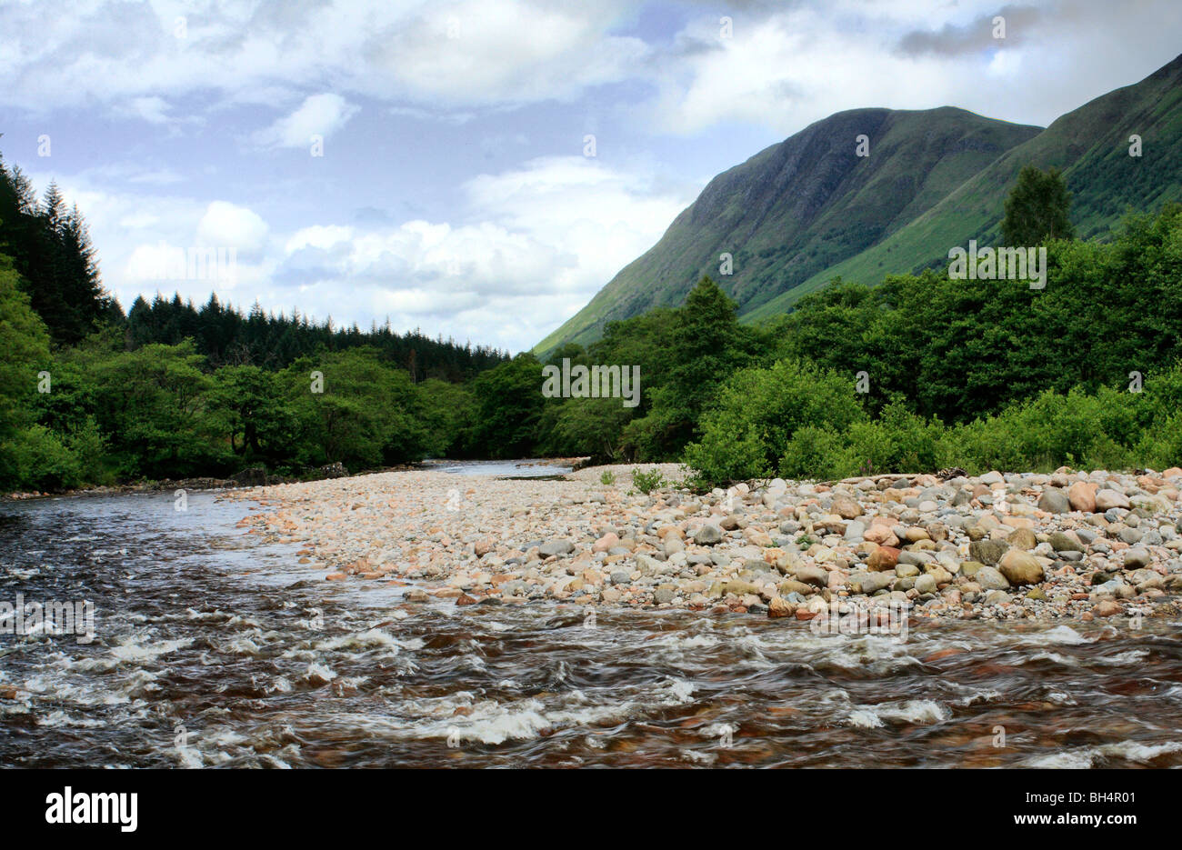 The river Nevis flowing over granite cobbles in Glen Nevis Stock Photo ...