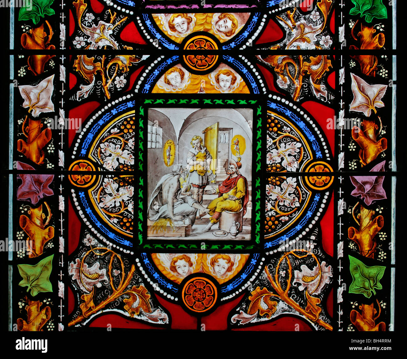 A 16th century stained glass window panel depicting Joseph in prison ...