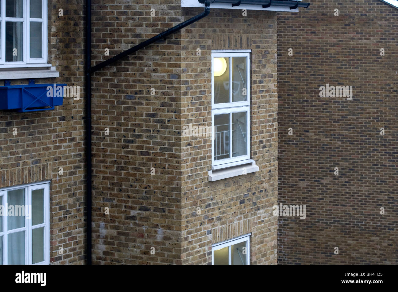 Windows in brick apartment building, London, England, UK Stock Photo ...