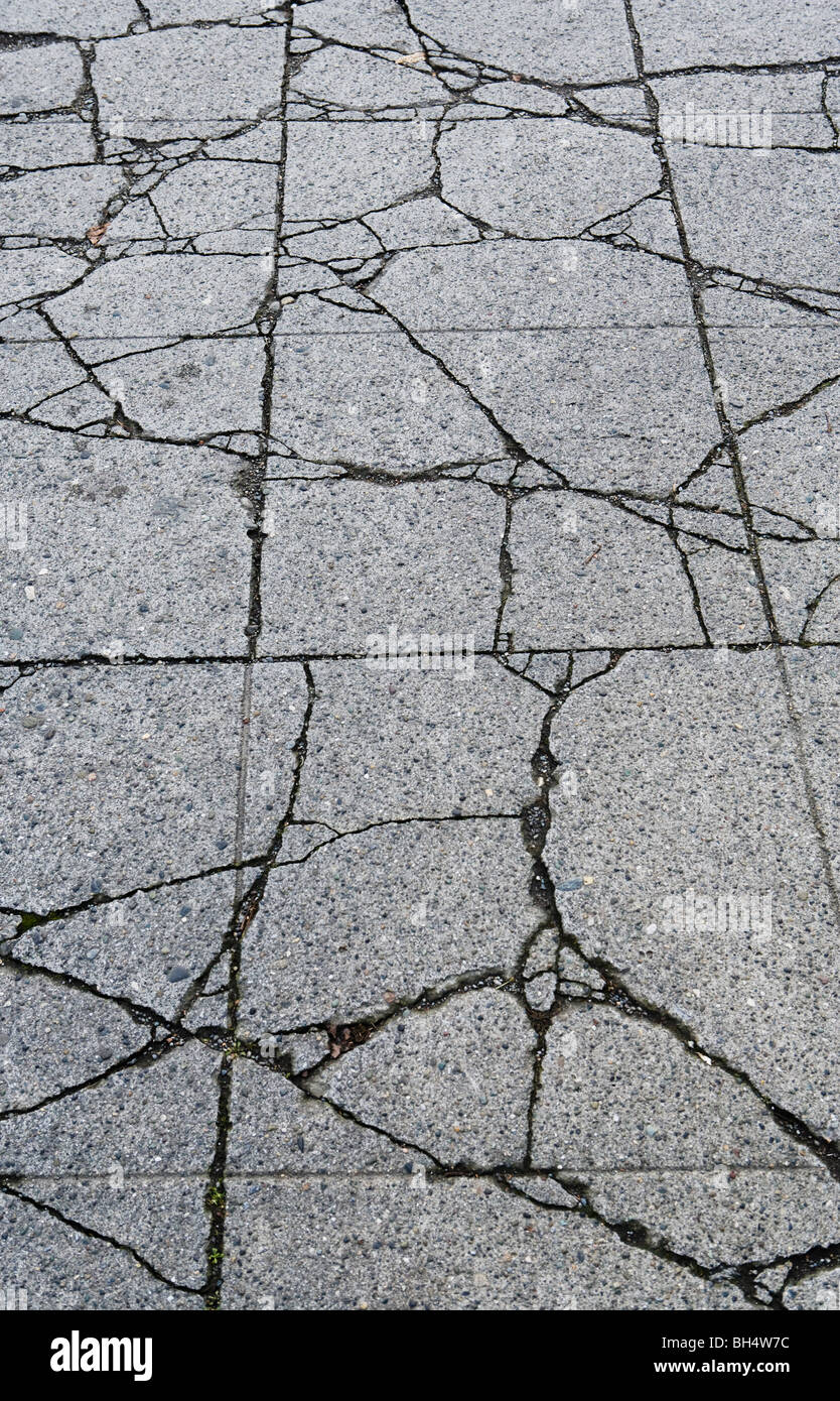 Cracks in concrete pavement Stock Photo - Alamy