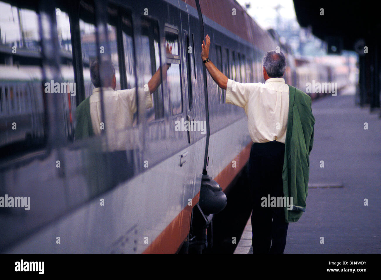 SAYING GOODBYE BEFORE THE DEPARTUE OF THE TRAIN FROM THE GARE DE LYON ...