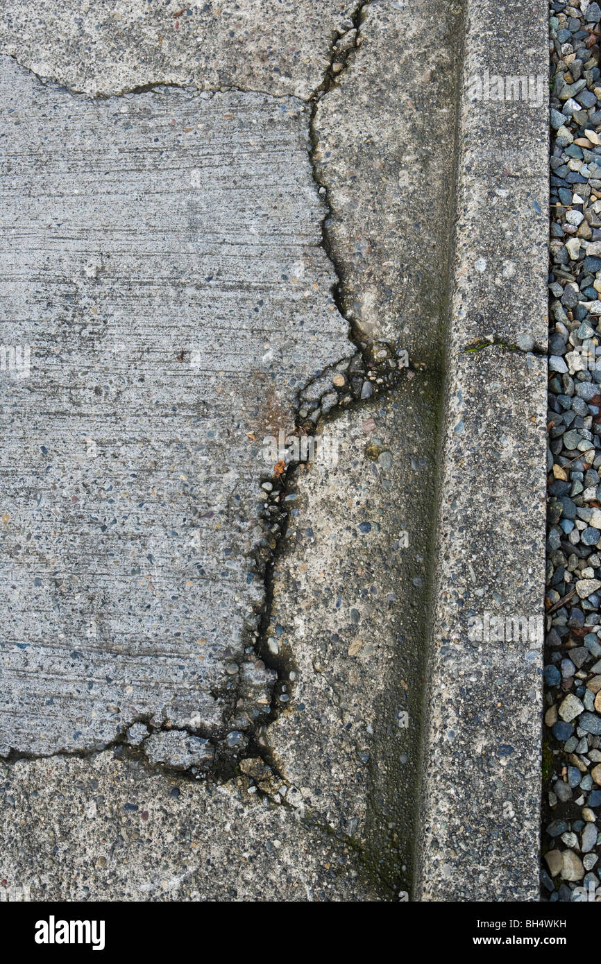 Cracks in concrete pavement Stock Photo - Alamy