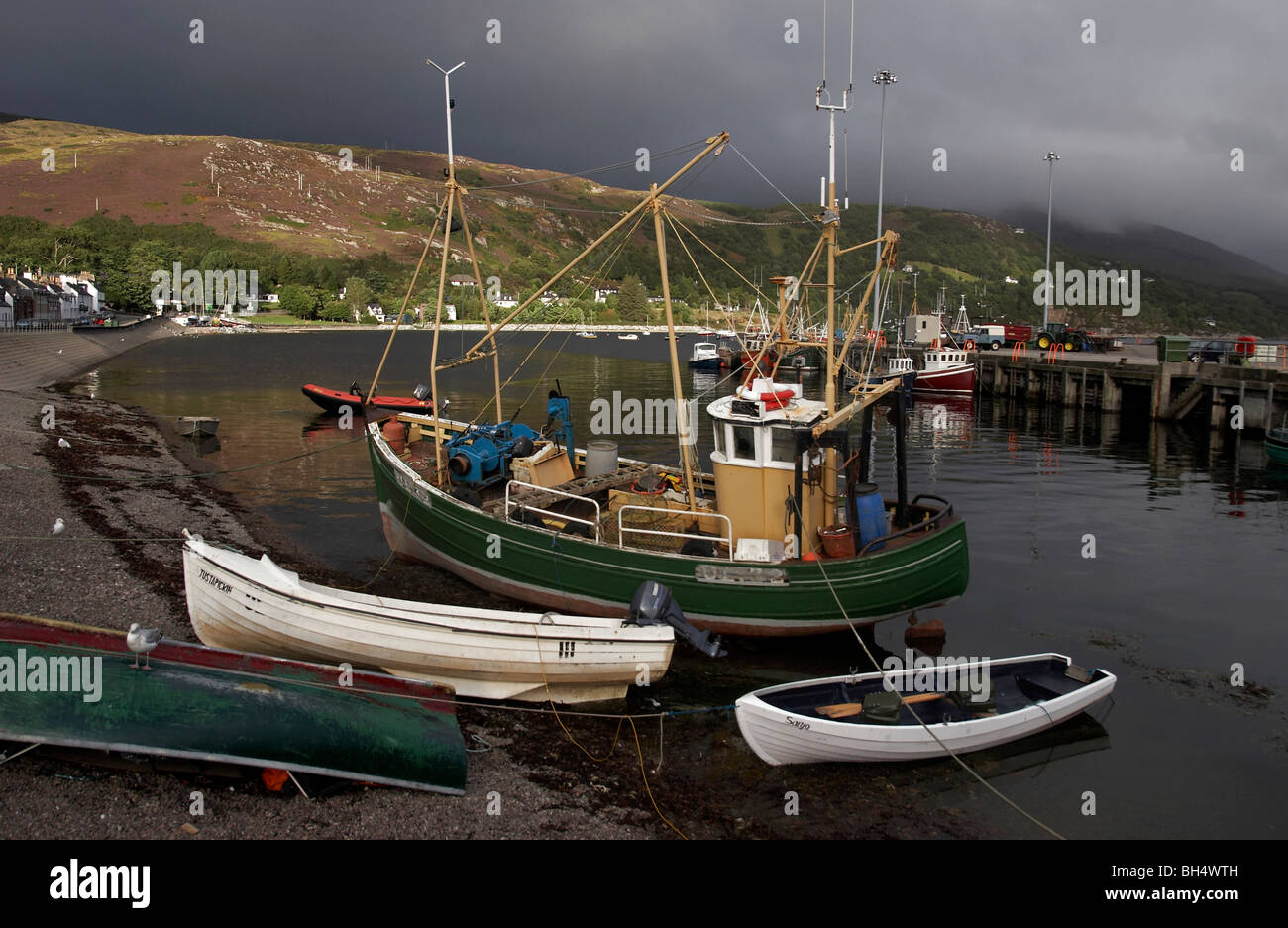Fishing boats in Ullapool bay Stock Photo - Alamy