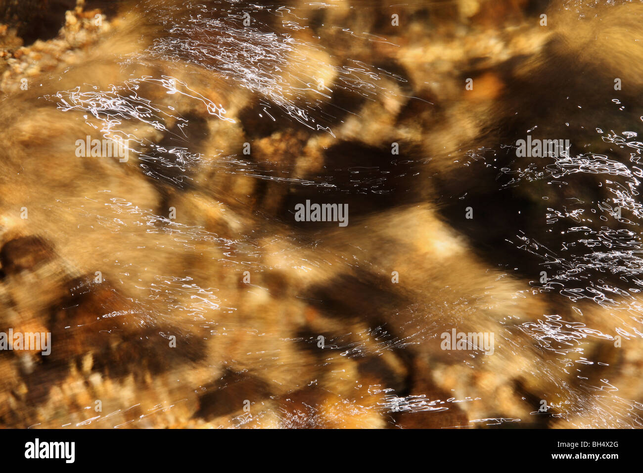 Pebbles in stream hi-res stock photography and images - Alamy
