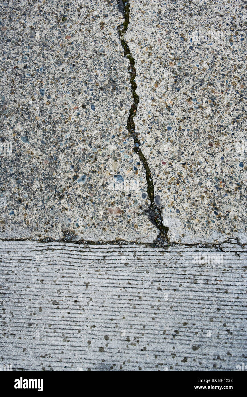 Cracks in concrete pavement Stock Photo - Alamy