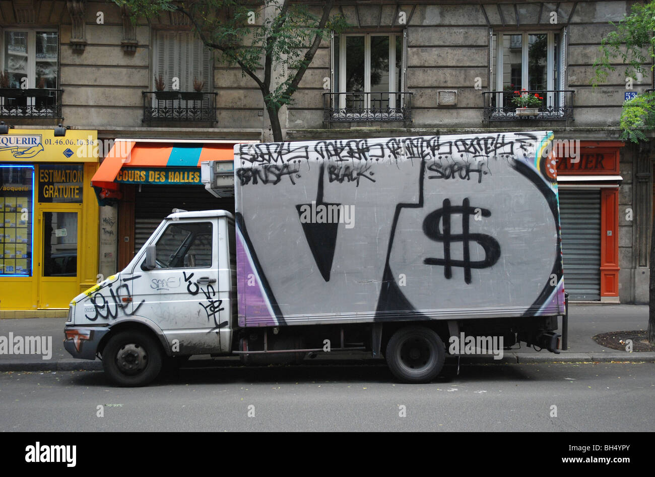 Graffiti covered van in Paris Stock Photo - Alamy