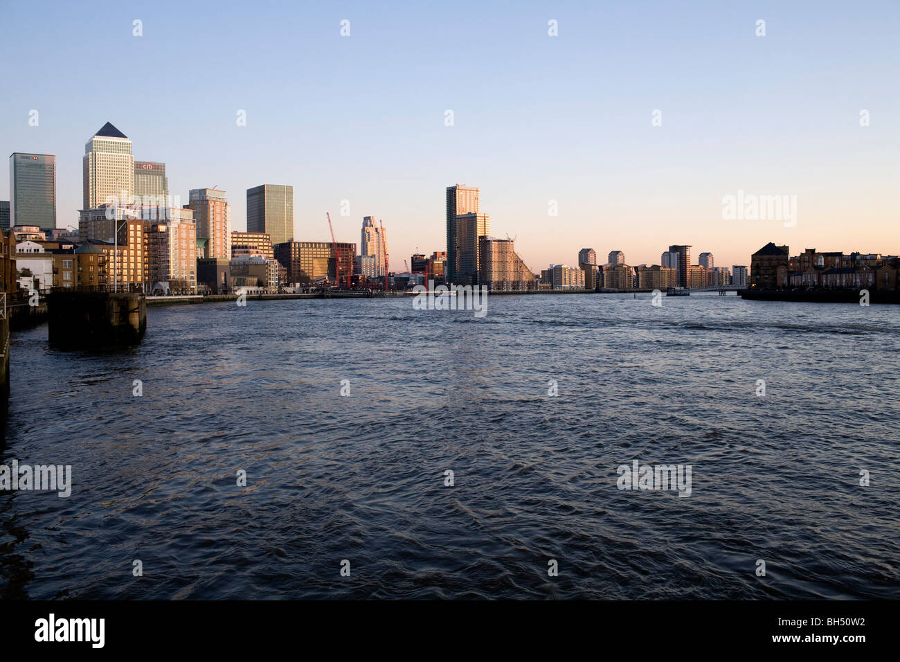 Canary Wharf viewed from the riverside of Thames, London, England, UK ...