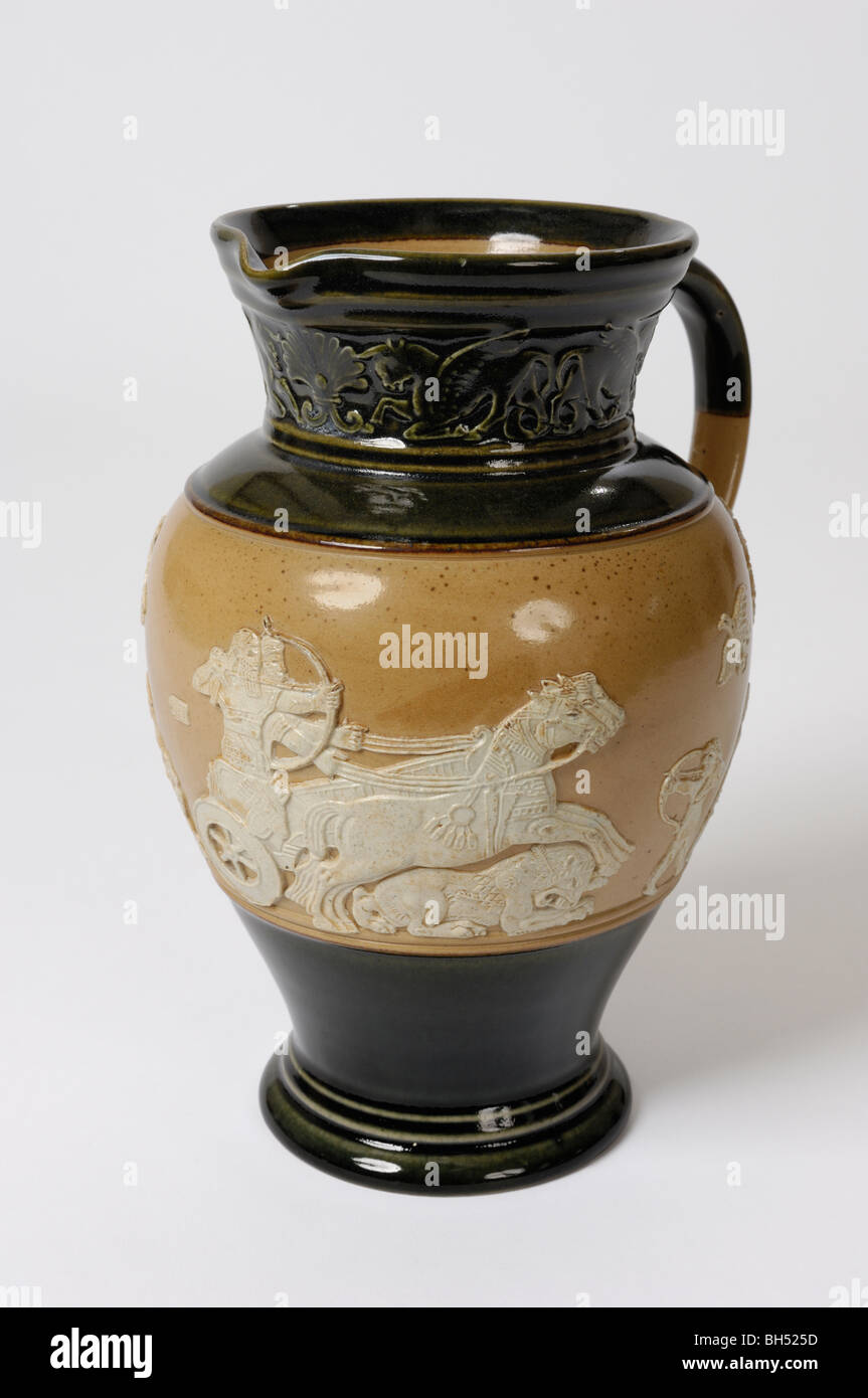 An 8 inch high English Doulton stoneware pottery jug depicting an ...
