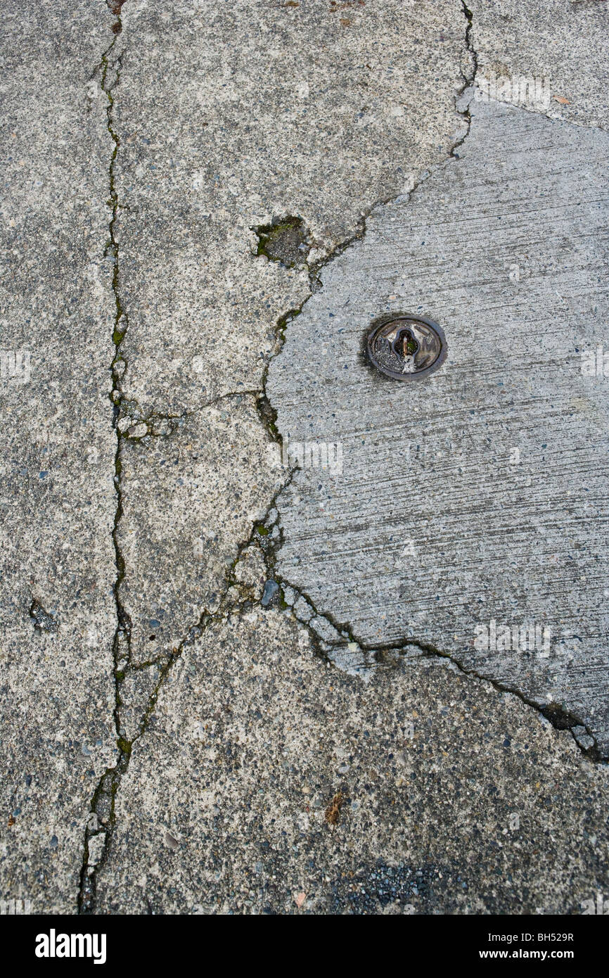 Cracks in concrete pavement Stock Photo - Alamy
