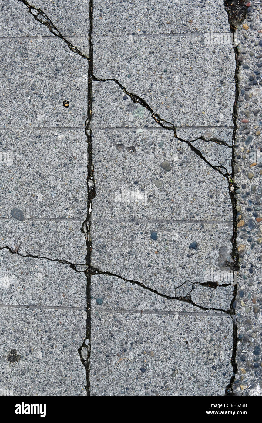 Cracks in concrete pavement Stock Photo - Alamy