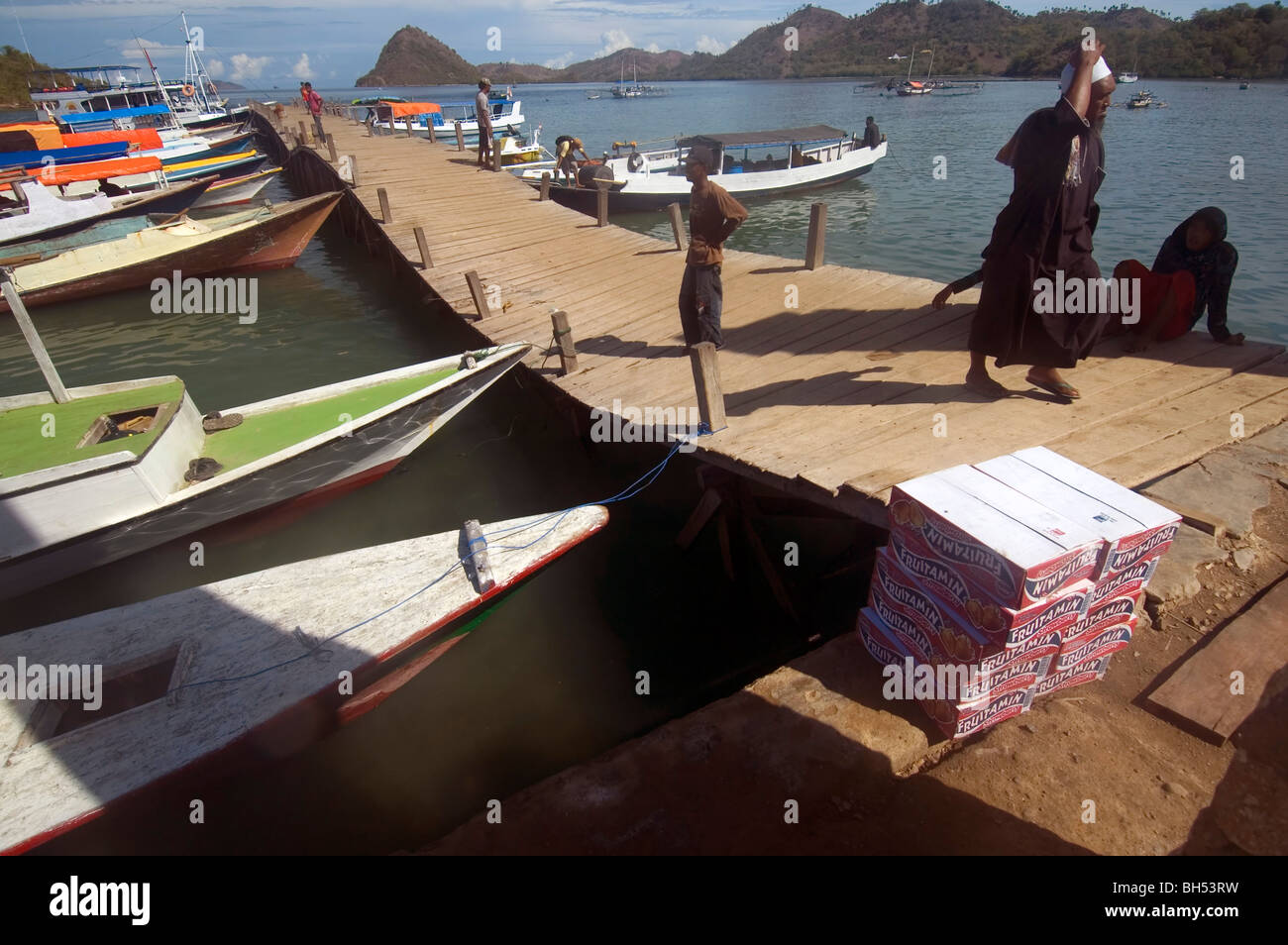 Jetty (slumping due to spectacularly rotted pilings) in harbour at ...