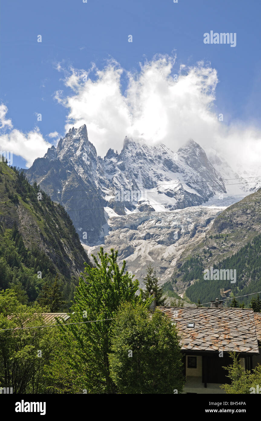 Peaks Aiguille Noire de Peuterey and Mont Blanc traditional tile house ...