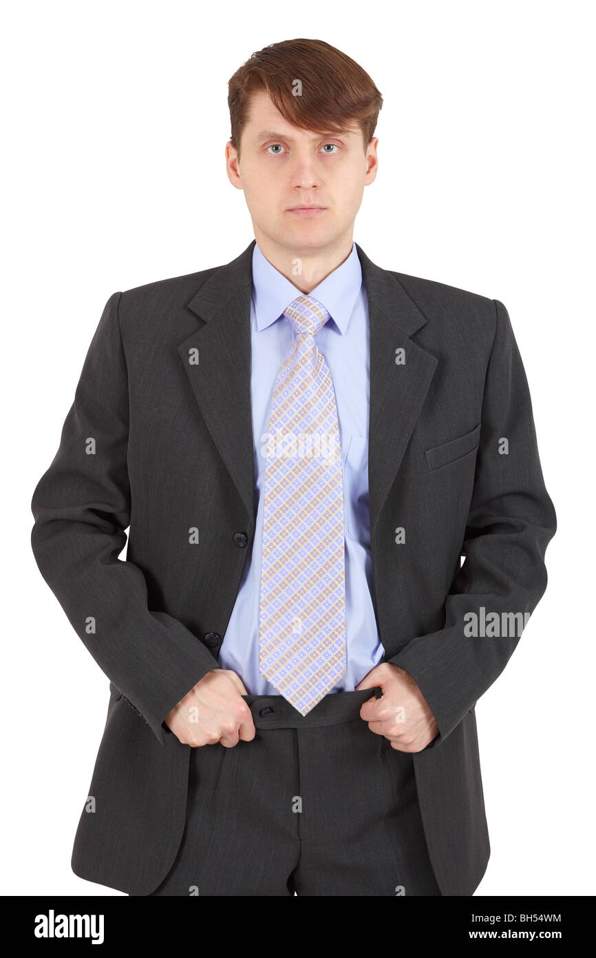Young serious businessman in a business suit isolated on white ...