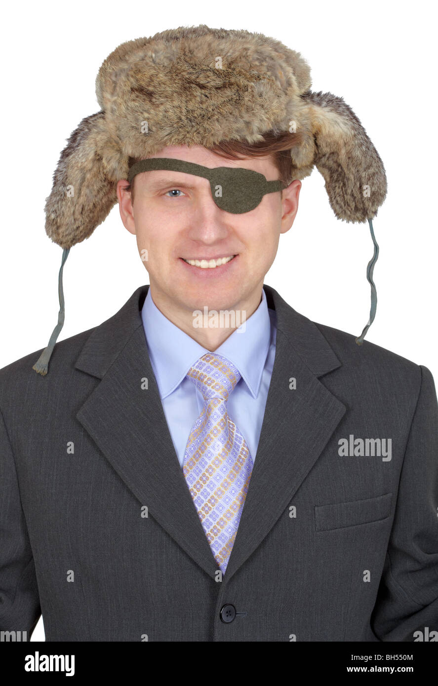 Laughing, one-eyed man in a fur hat, isolated on a white background ...