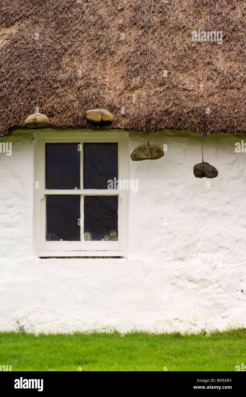 Traditional thatched crofting cottage at Luib, Isle of Skye, window ...