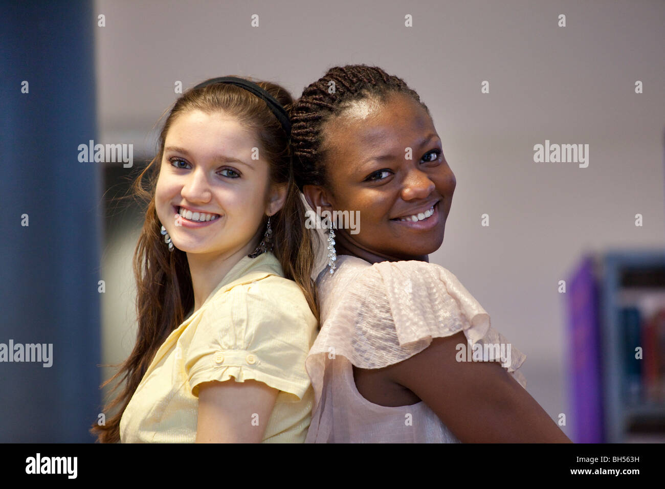 Portrait of two happy teenage girls looking into the camera Stock Photo ...