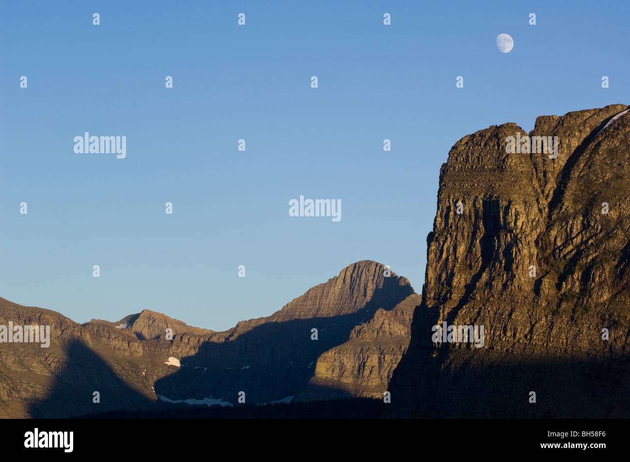 Moonrise above Heavy Runner Mountain looking east from Logan Pass Stock ...