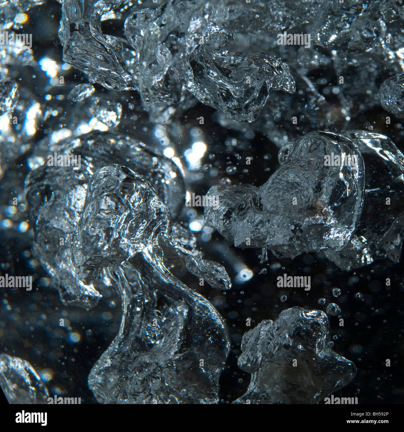 Water boiling in a glass container Stock Photo - Alamy