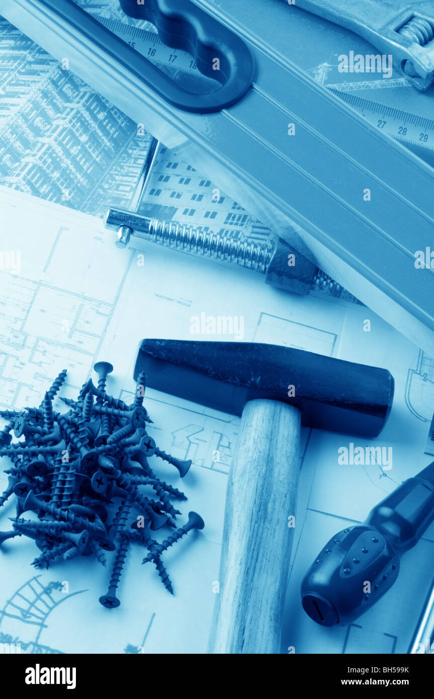 Working tools on a background of drawings Stock Photo - Alamy