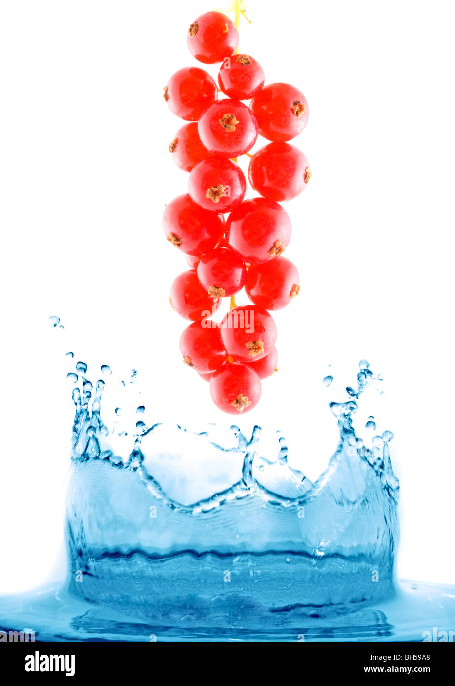 berry and fruit falling in juice. Isolation Stock Photo - Alamy
