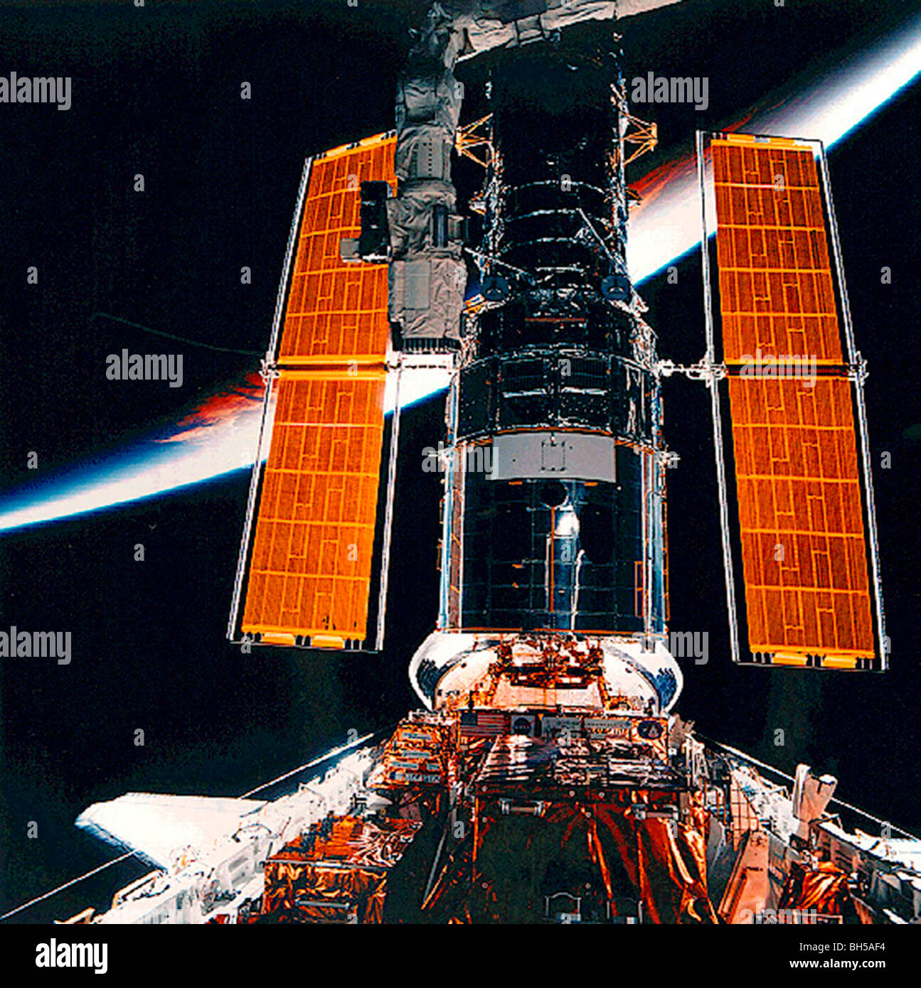 NASA Hubble Space Telescope departing shuttle above earth Stock Photo ...