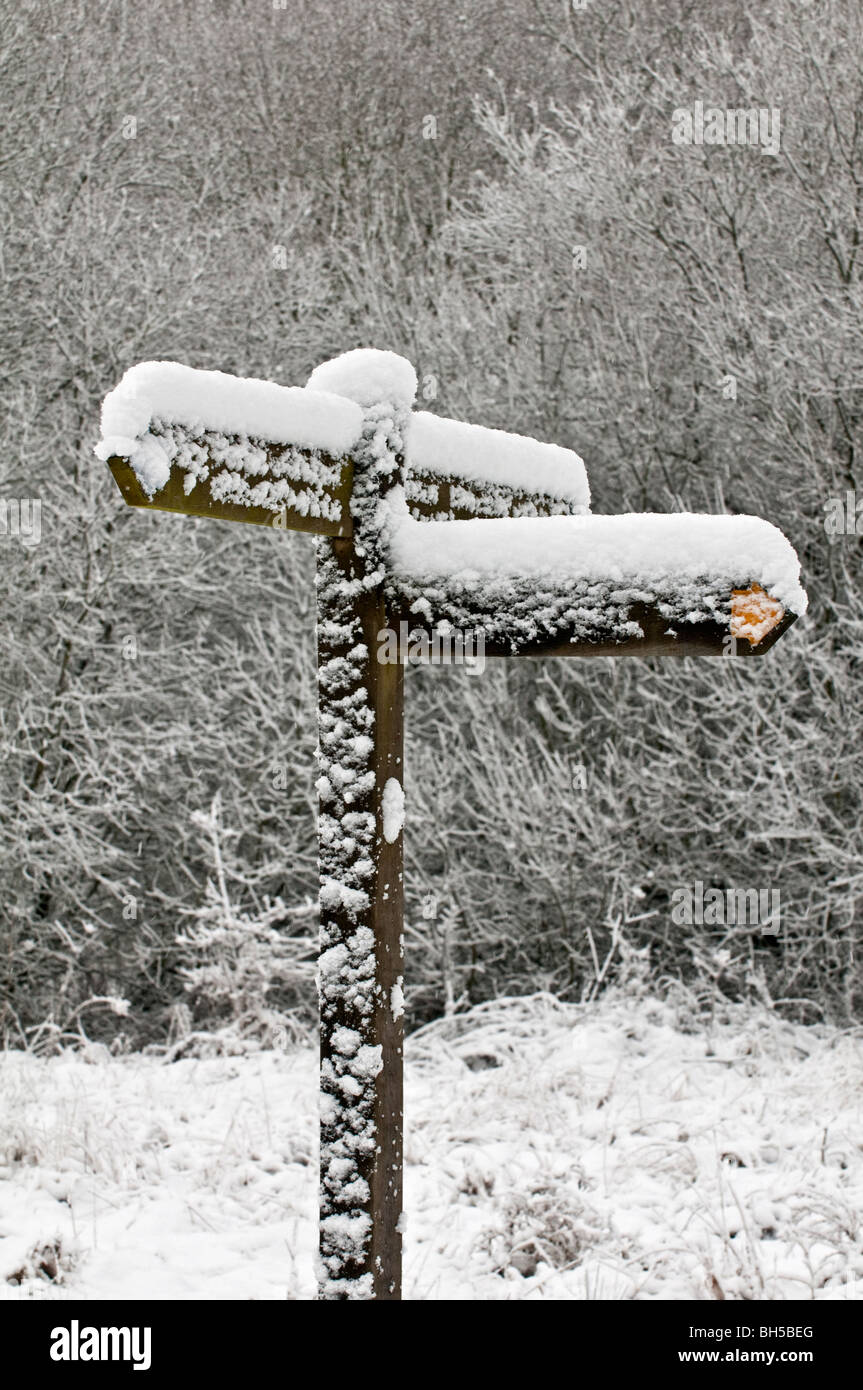 signpost obscured by snow Stock Photo - Alamy