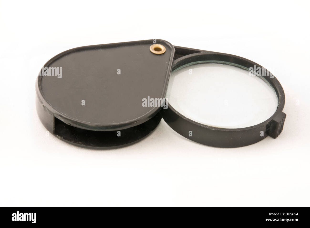 Folding magnifying glass Stock Photo - Alamy