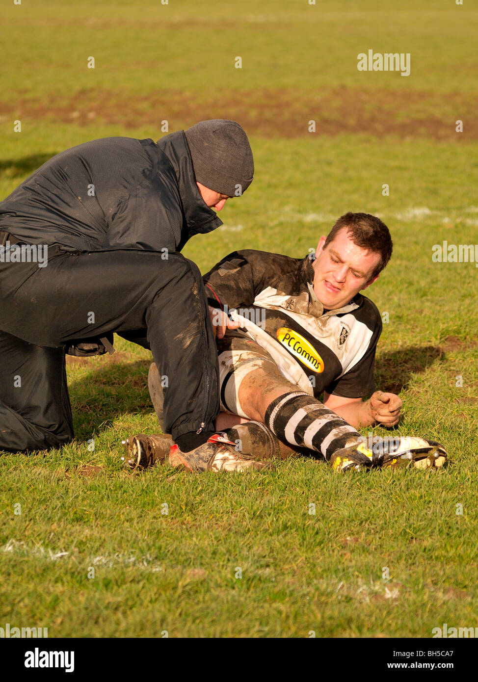 Injured rugby player receiving treatment hi-res stock photography and ...