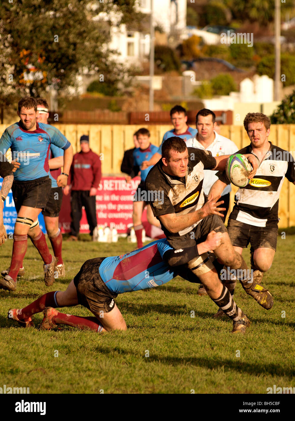 The tackle, Bude against North Petherton rugby match, Cornwall Stock ...