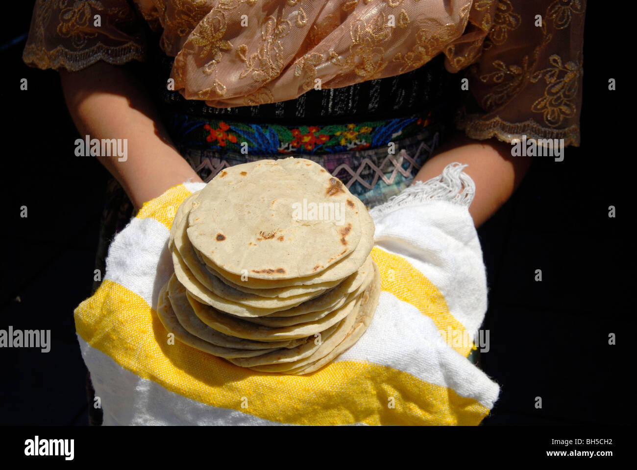 Guatemala. Native quiche indian girl making maize 'tortillas' Stock ...