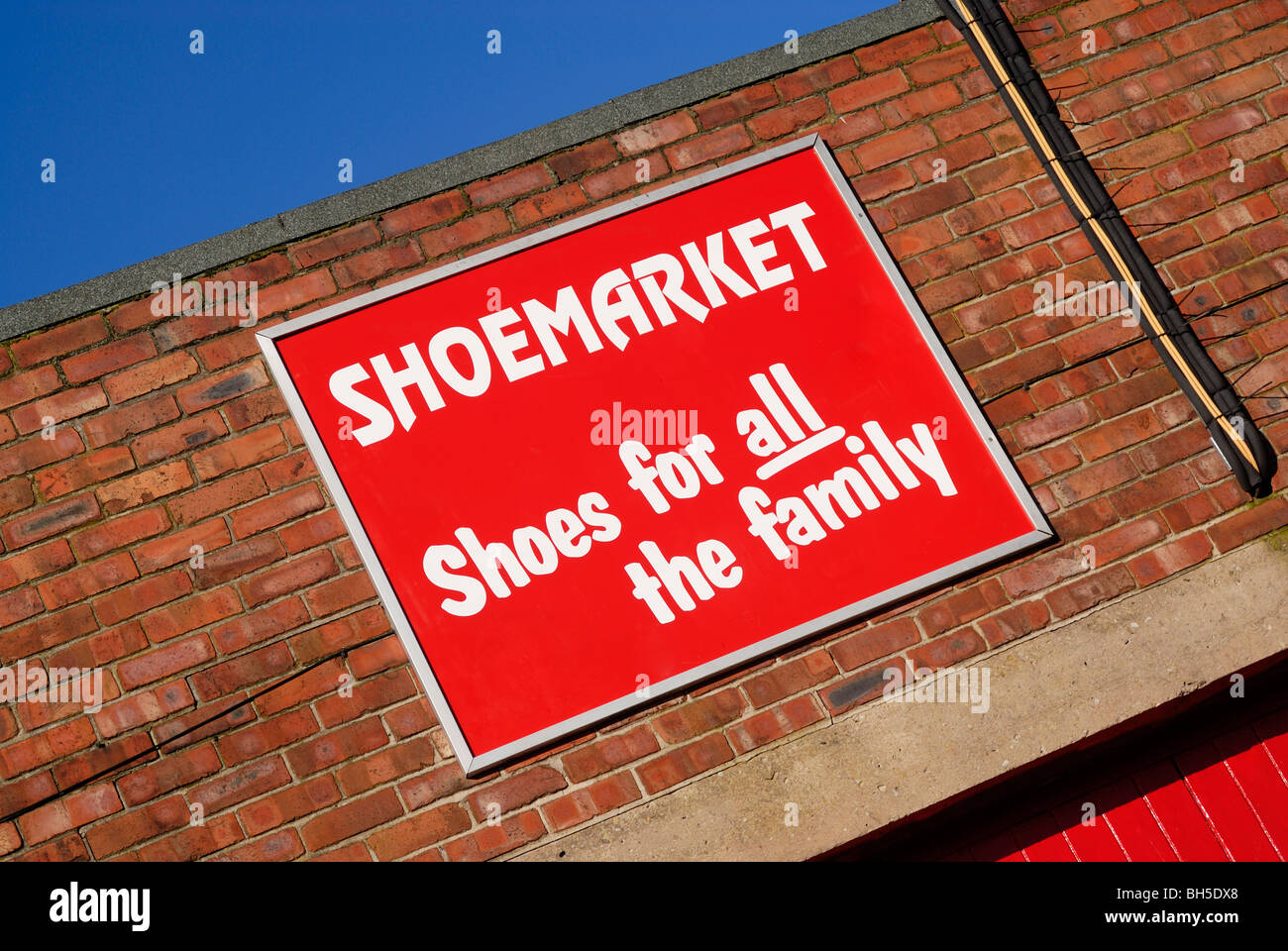 Bright red Shoemarket sign Stock Photo - Alamy