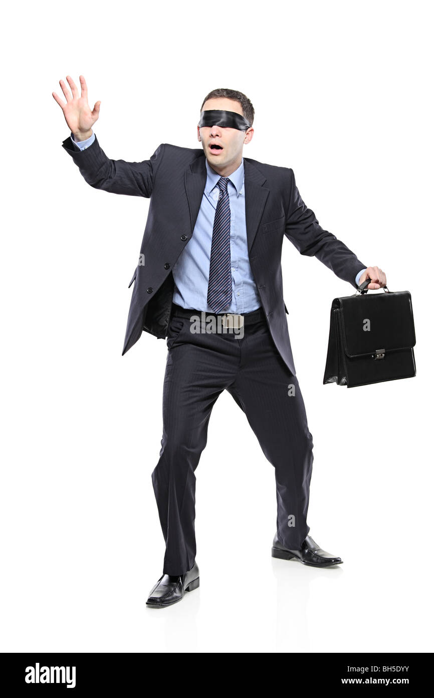Blindfolded businessman isolated on white background Stock Photo - Alamy