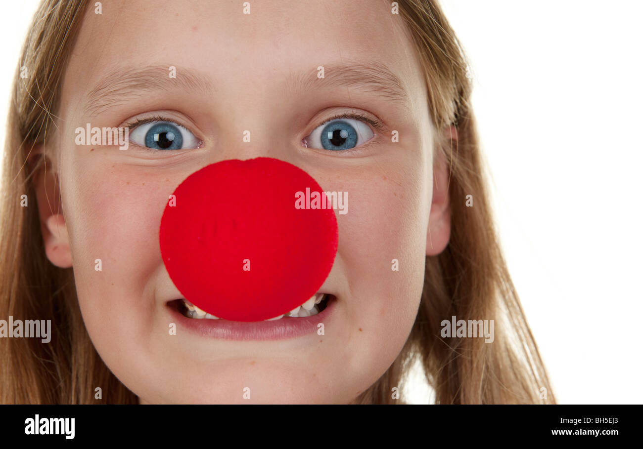 young girl with a red nose Stock Photo - Alamy