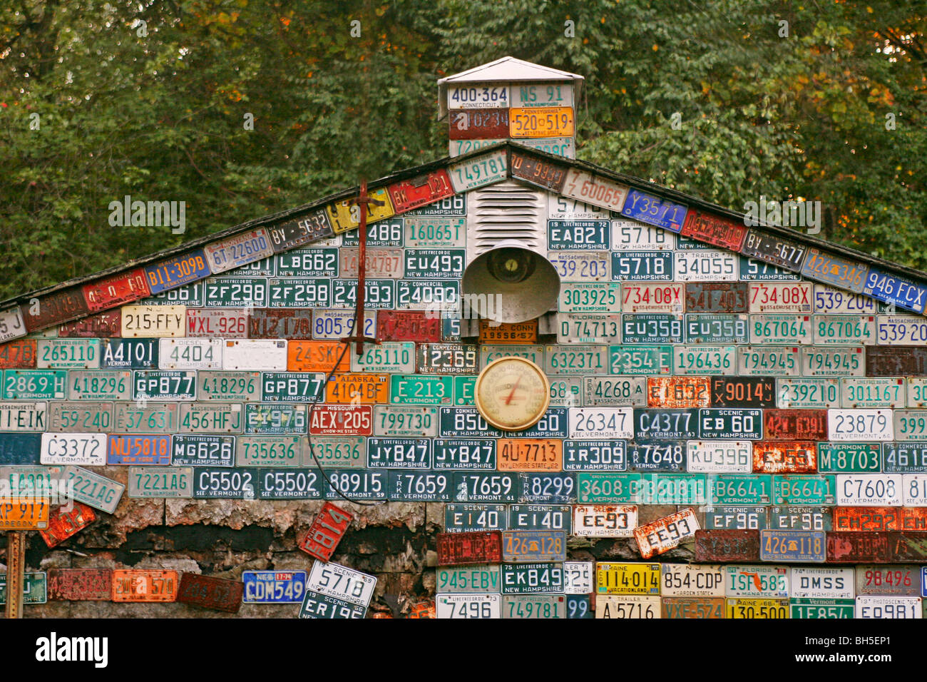 wall of metal car license plates on garage Stock Photo - Alamy