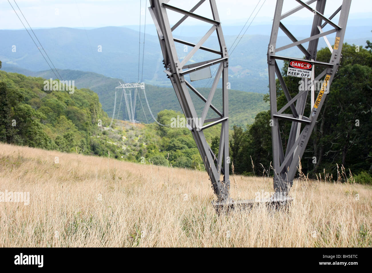 high voltage on a power line trail Stock Photo - Alamy