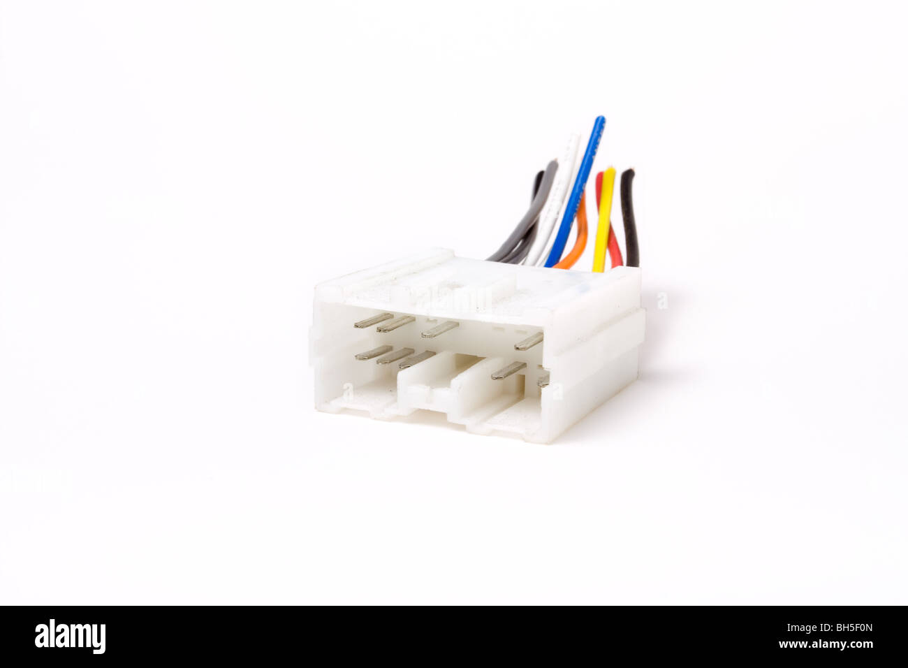 Multi pin car audio DIN connector isolated against white background ...