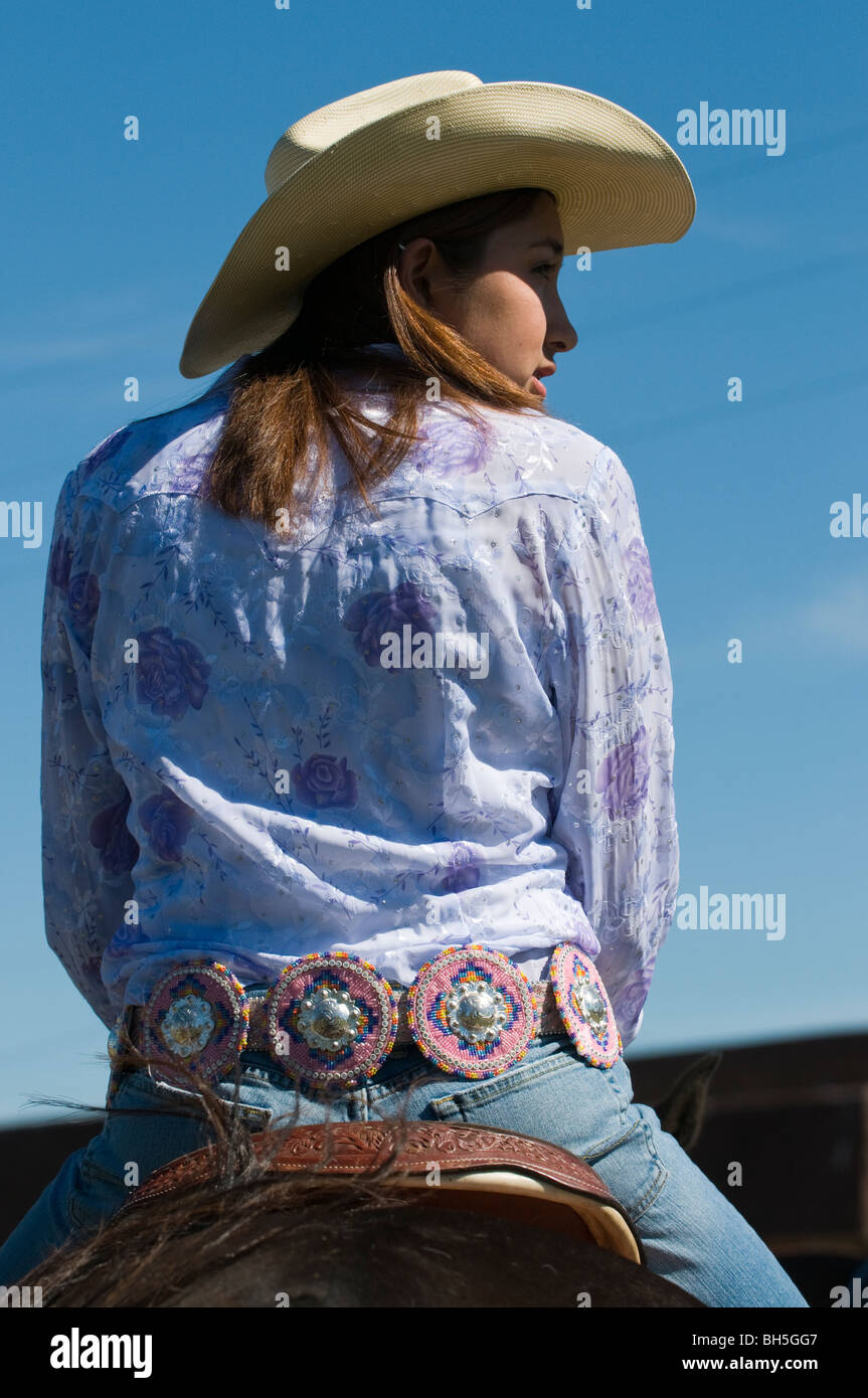 Native American woman with cowboy hat on horse Stock Photo - Alamy