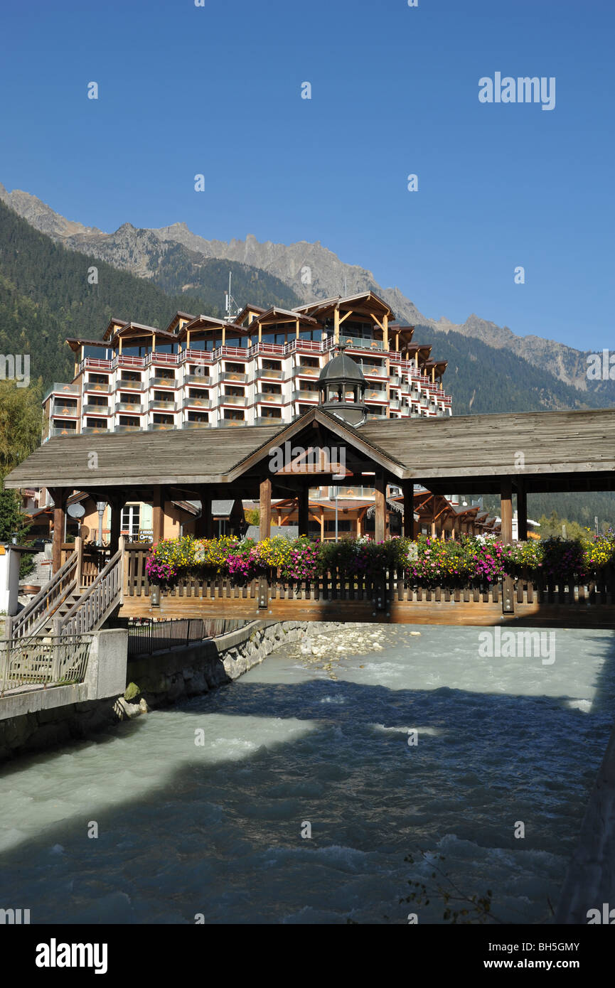 Foot bridge over the River Arve in the Alpine town of Chamonix Mont ...