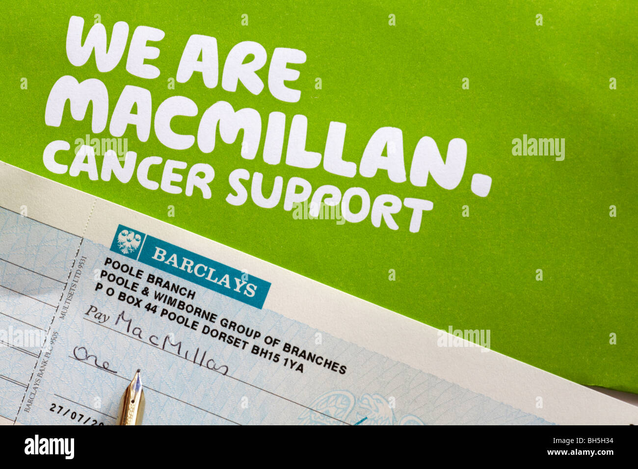 writing a cheque to Macmillan charity in response to we are Macmillan ...