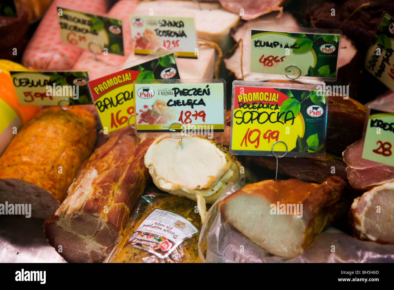 Polish sausages and cooked meat / meats in a chiller cabinet, in ...