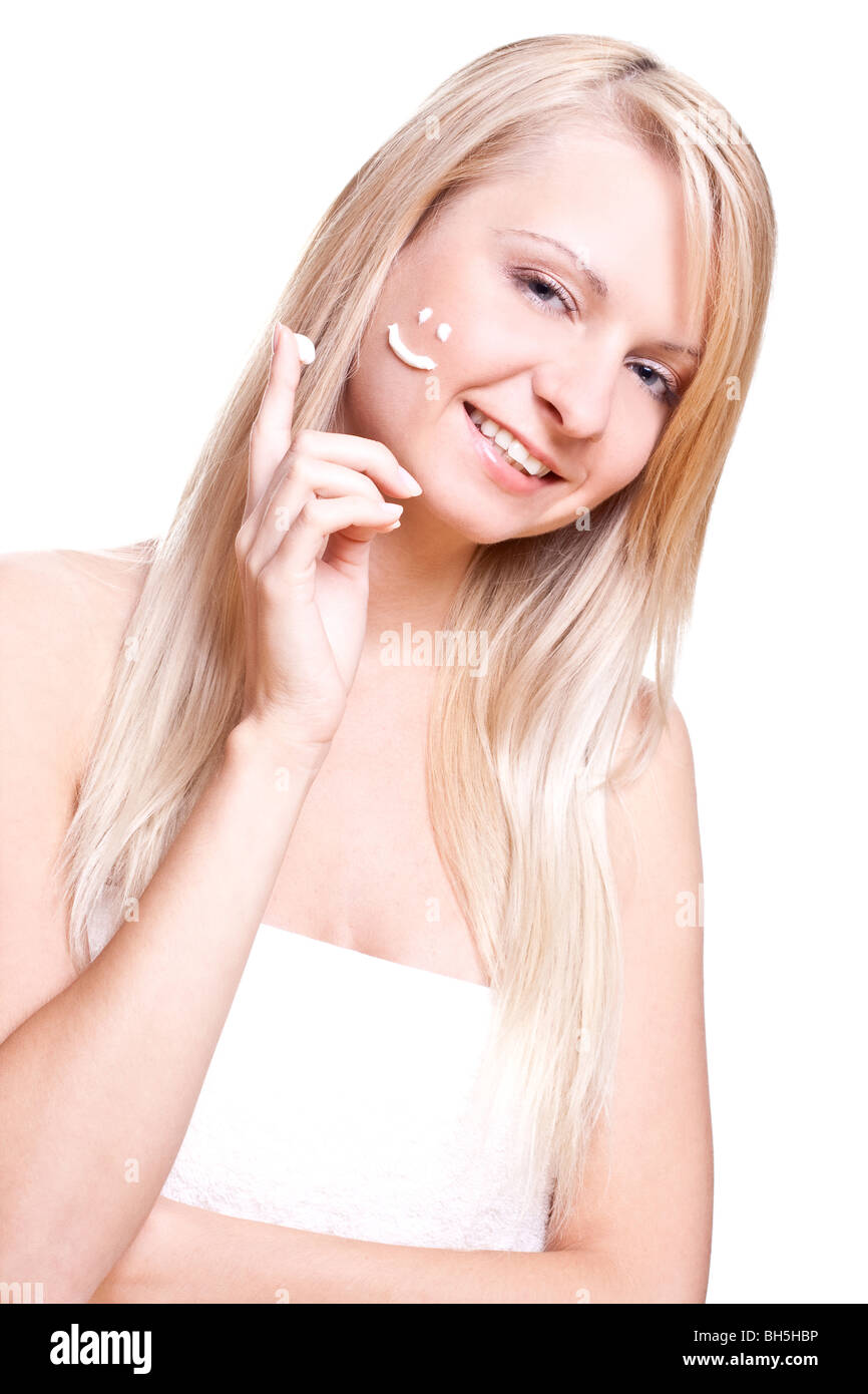 beautiful woman with cream on a white background Stock Photo - Alamy