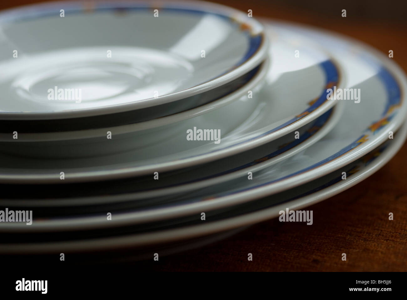 A small stack of plates, and saucers Stock Photo - Alamy