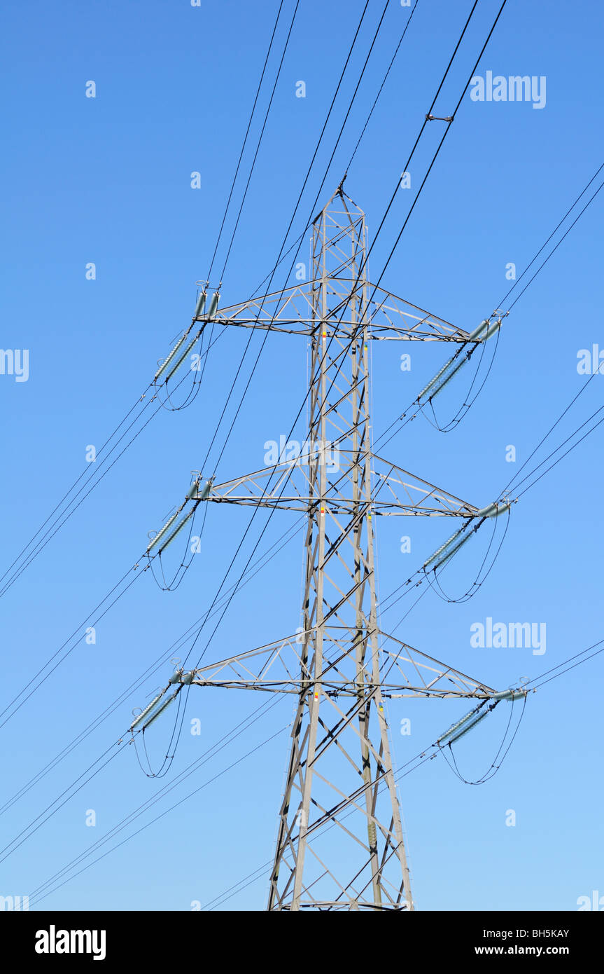 UK National Grid Electricity pylon and blue sky Stock Photo - Alamy