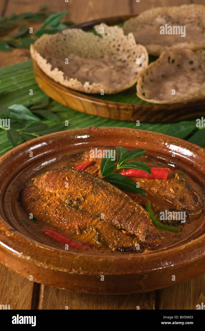 Kerala fish curry with appams South India food Stock Photo - Alamy