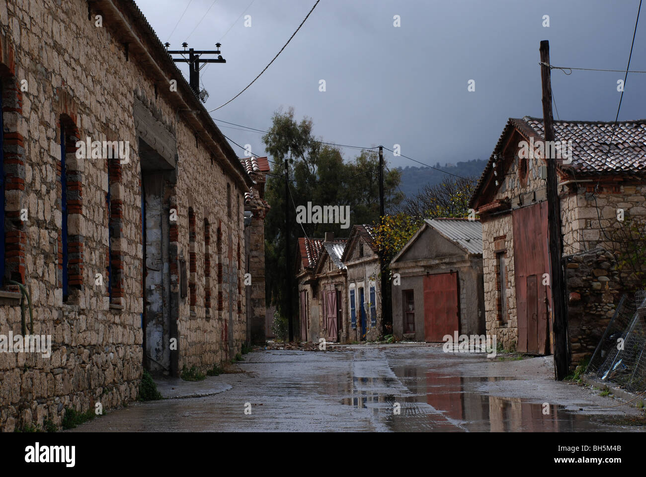 wet street in a derelict tannery district Stock Photo - Alamy