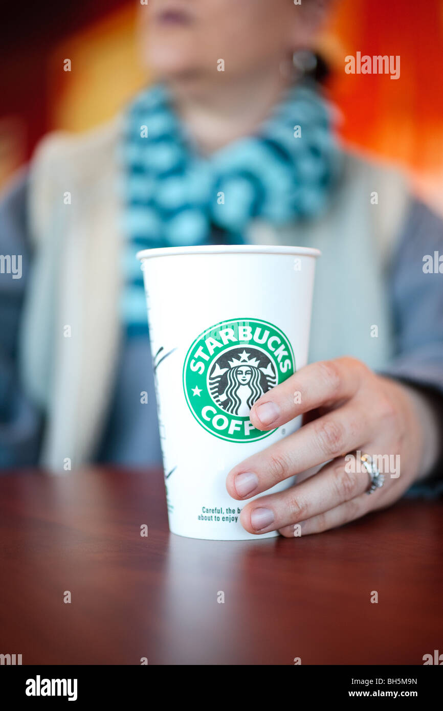 Woman drinking coffee starbucks hi-res stock photography and images - Alamy