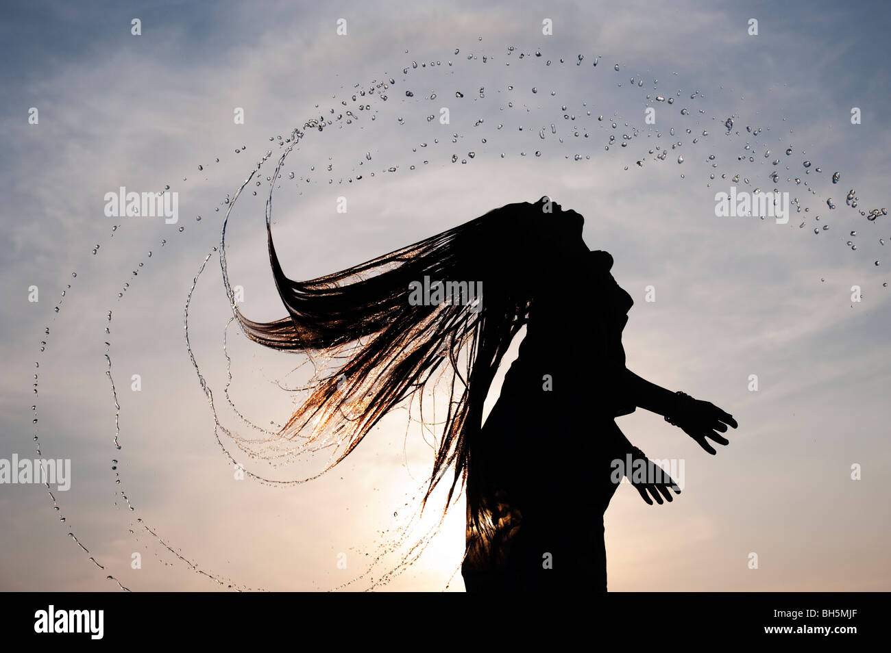 Flicking hair back hi-res stock photography and images - Alamy