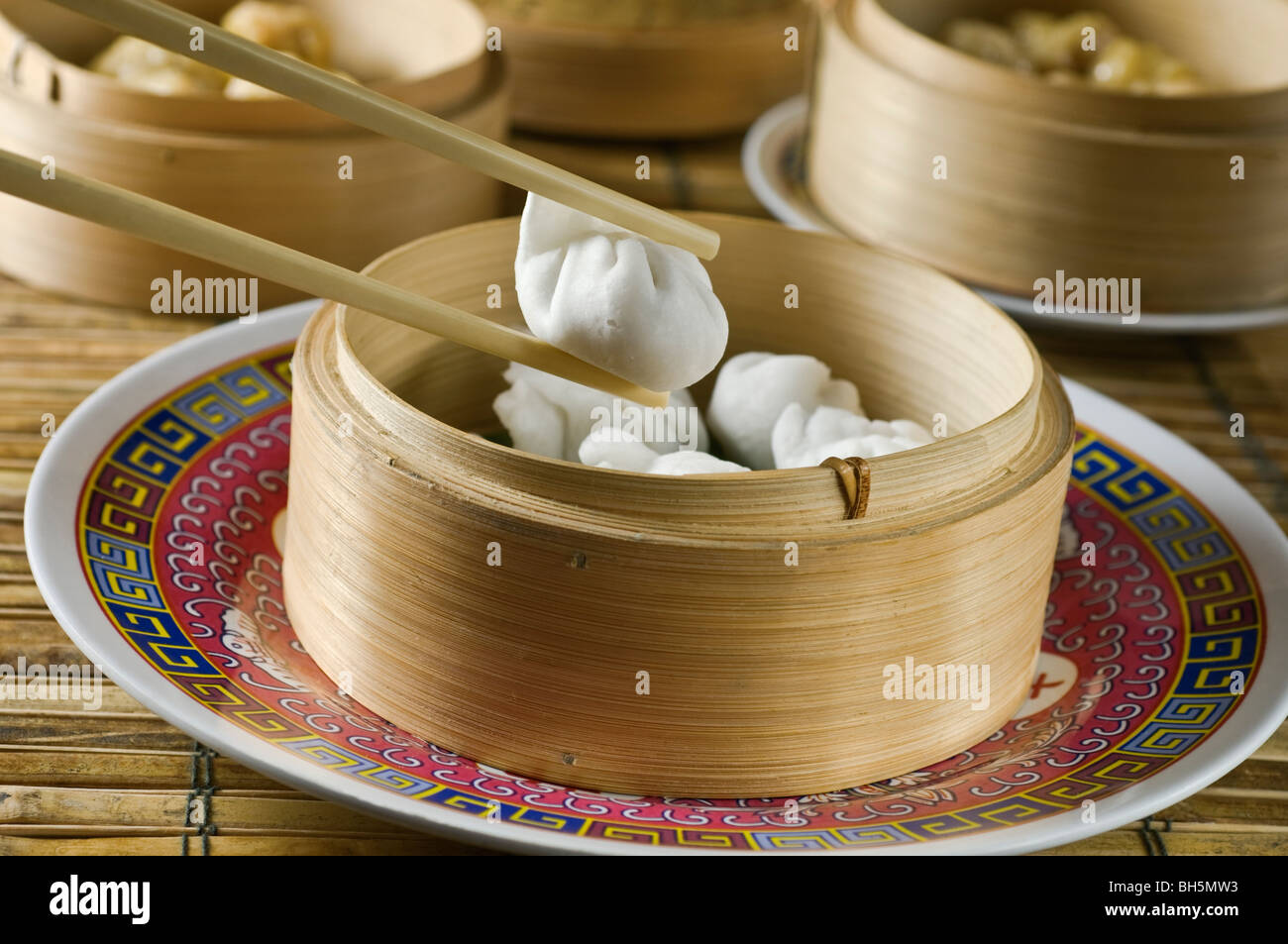 Dim sum Chinese dumplings in steamer baskets Stock Photo - Alamy