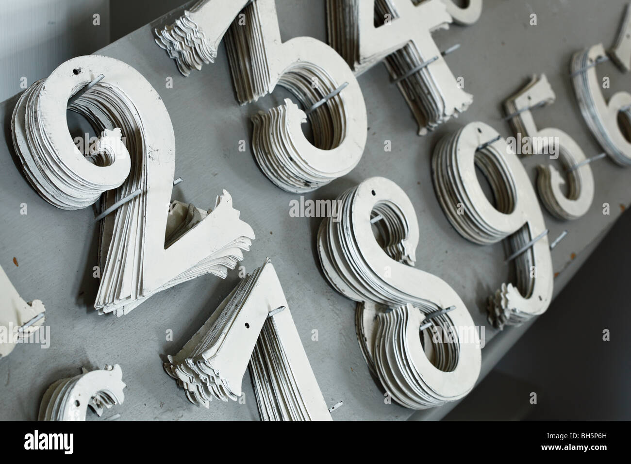 Metallic numeric psalm numbers hanging in a church Stock Photo - Alamy